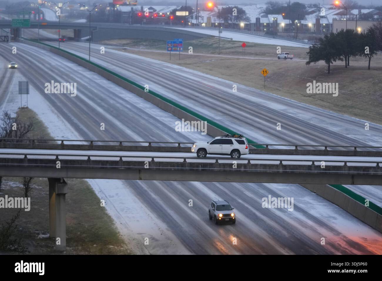 Empty lanes are visible along Interstate-20 during a winter storm ...