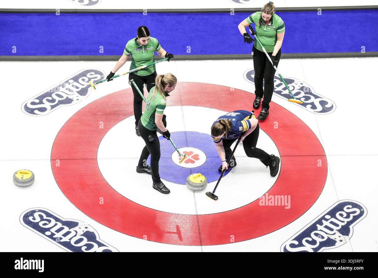 Nova Scotia Stevens vice-skip Maria Fitzgerald brushes a Saskatchewan ...