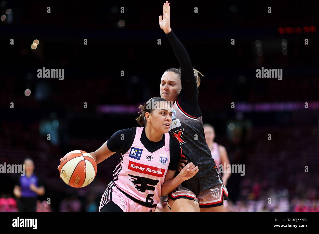 Shaneice Swain of the Flames drives to the basket during the WNBL Round ...