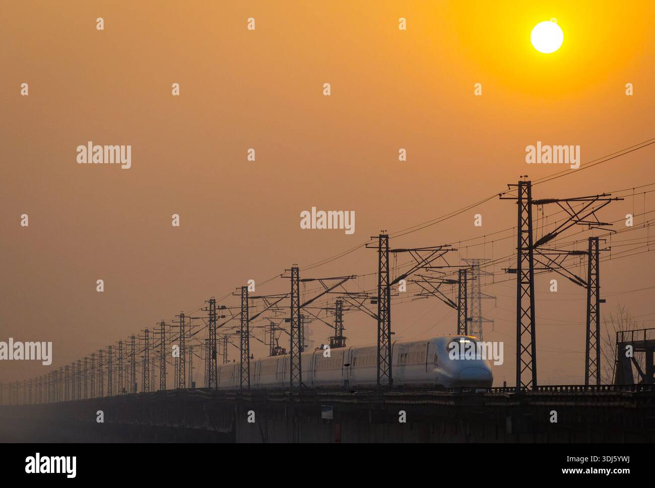 A train is running on Nanjing Kidong Railway in Taizhou City, Jiangsu ...