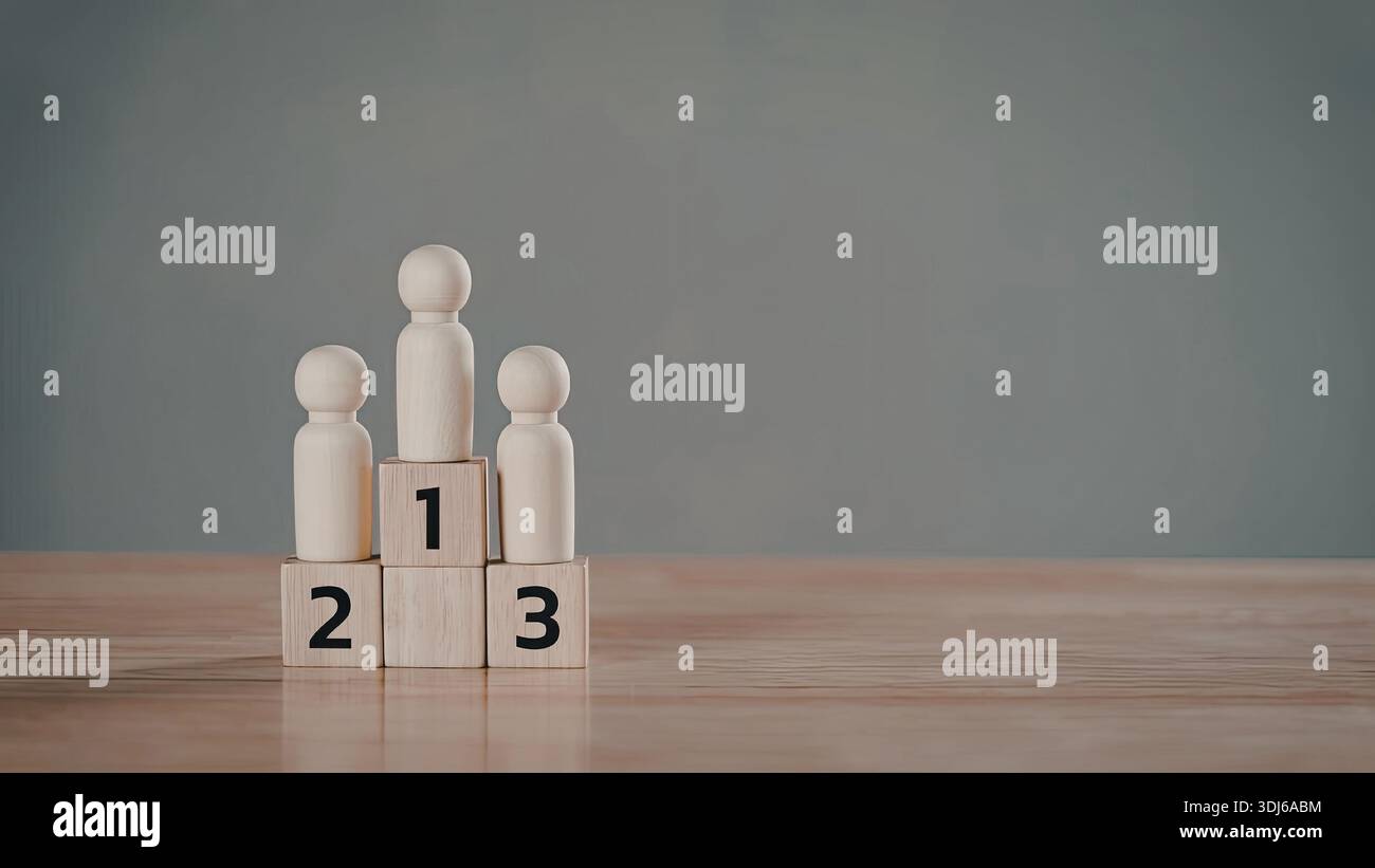 The image features three wooden figurines standing on blocks numbered 1 ...