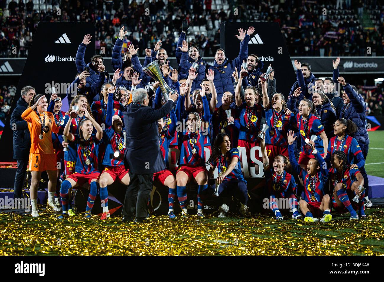 Players of Barcelona celebrate the victory with the trophy during the ...