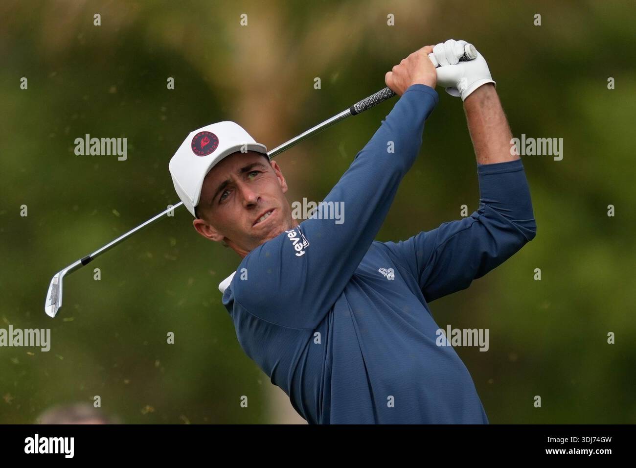 David Puig of Spain tees off at 4th hole during the final round of the ...
