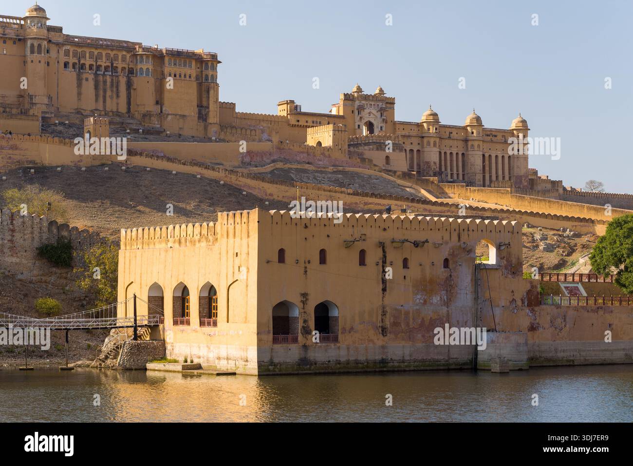Jaipur, India - March 16, 2022: The yellow sandstone walls and towers ...