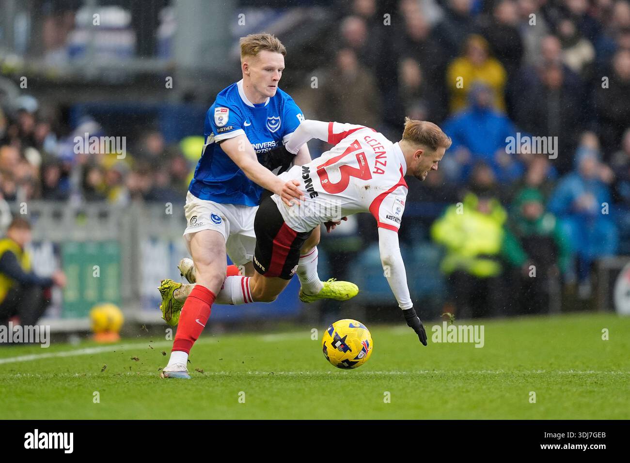 Portsmouth's Terry Devlin (left) and Southampton's Leo Scienza battle ...