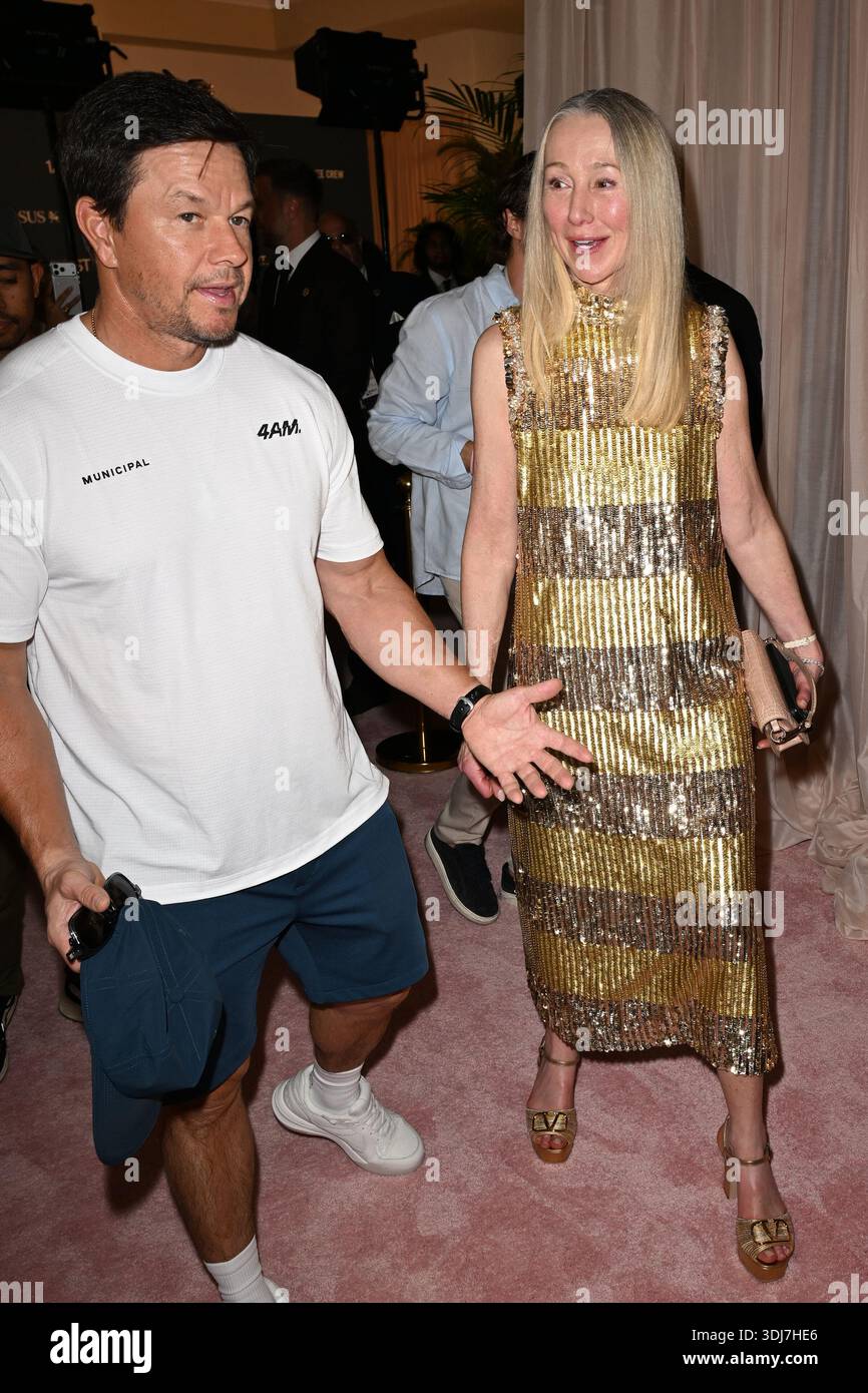 HALLANDALE, FLORIDA - JANUARY 24: Mark Wahlberg and Belinda Stronach ...