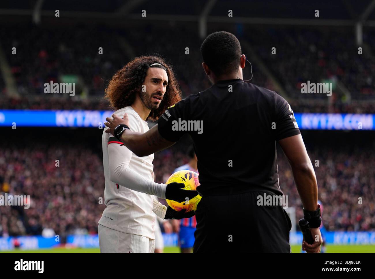 Chelsea's Marc Cucurella speaks to an assistant referee during the ...