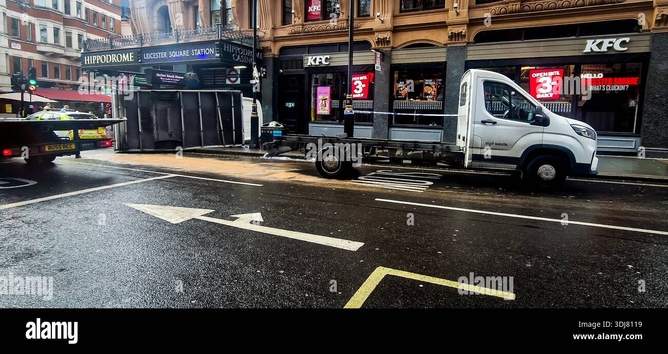 An overturned Lorry mounted the pavement, closing off access to ...