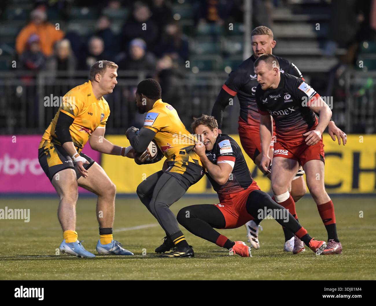 Max Malins of Saracens tackles Christian Wade of Newcastle Red Bulls ...