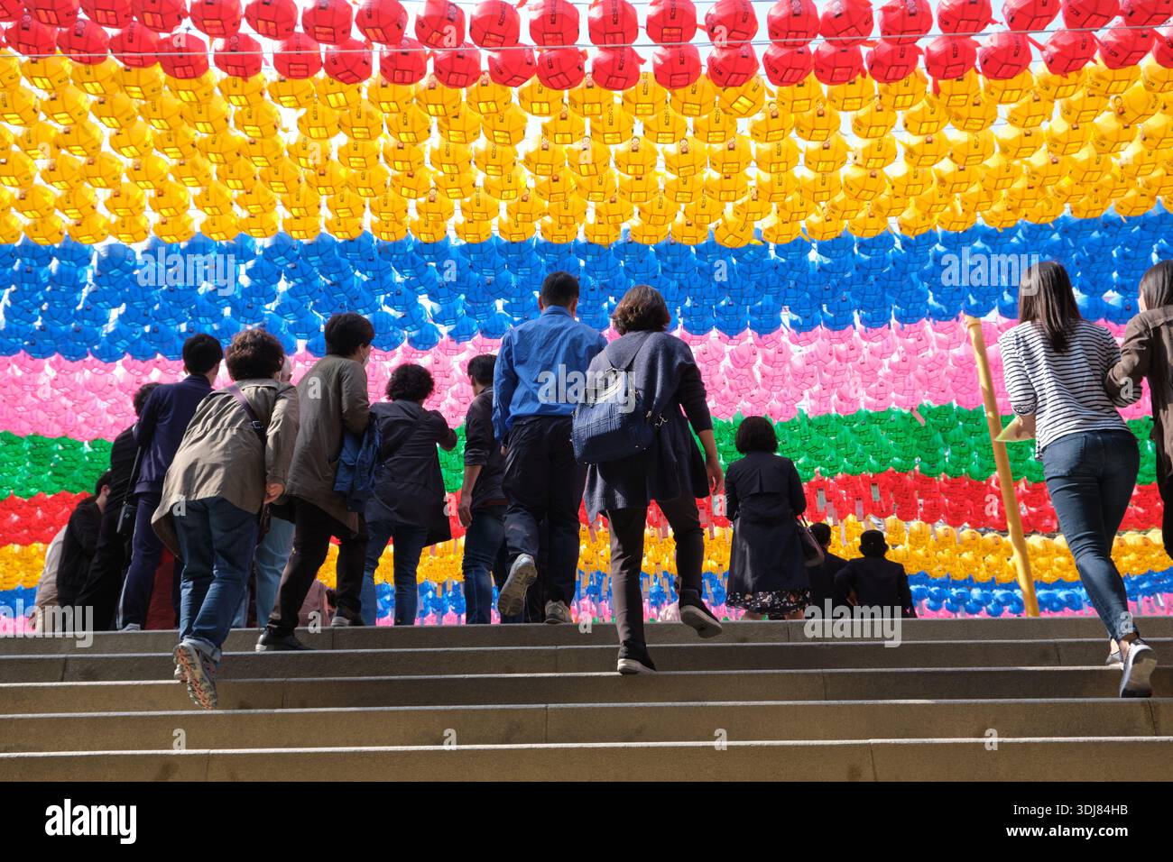 Seoul, South Korea: Visitors walking beneath colorful lantern canopy at ...