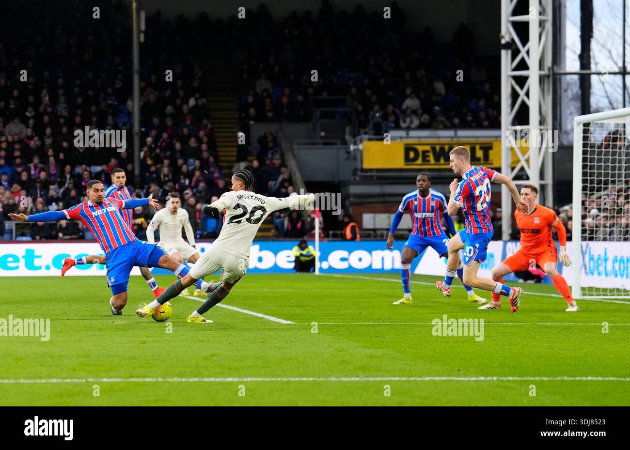 Chelsea's Joao Pedro (centre) scores their side's second goal of the ...