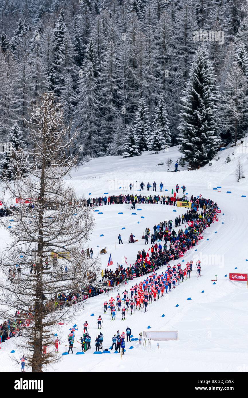 Athletes compete during the men's 20km mass start classic skiing race ...
