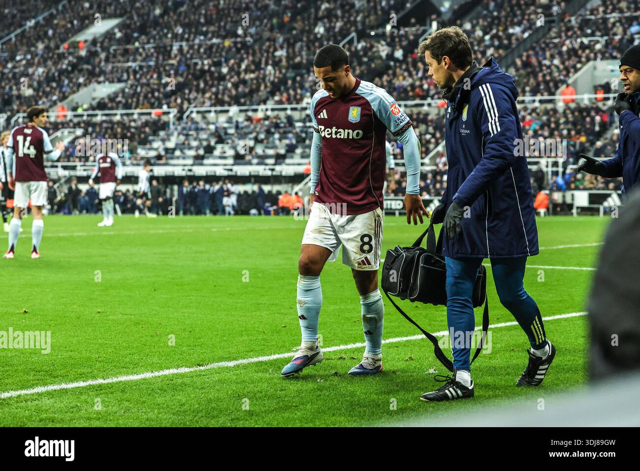 Youri Tielemans of Aston Villa leaves the field of play due to injury ...