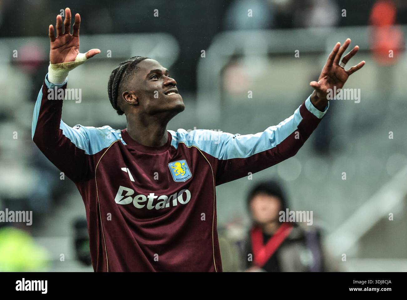 Amadou Onana of Aston Villa celebrates the win with the fans during the ...