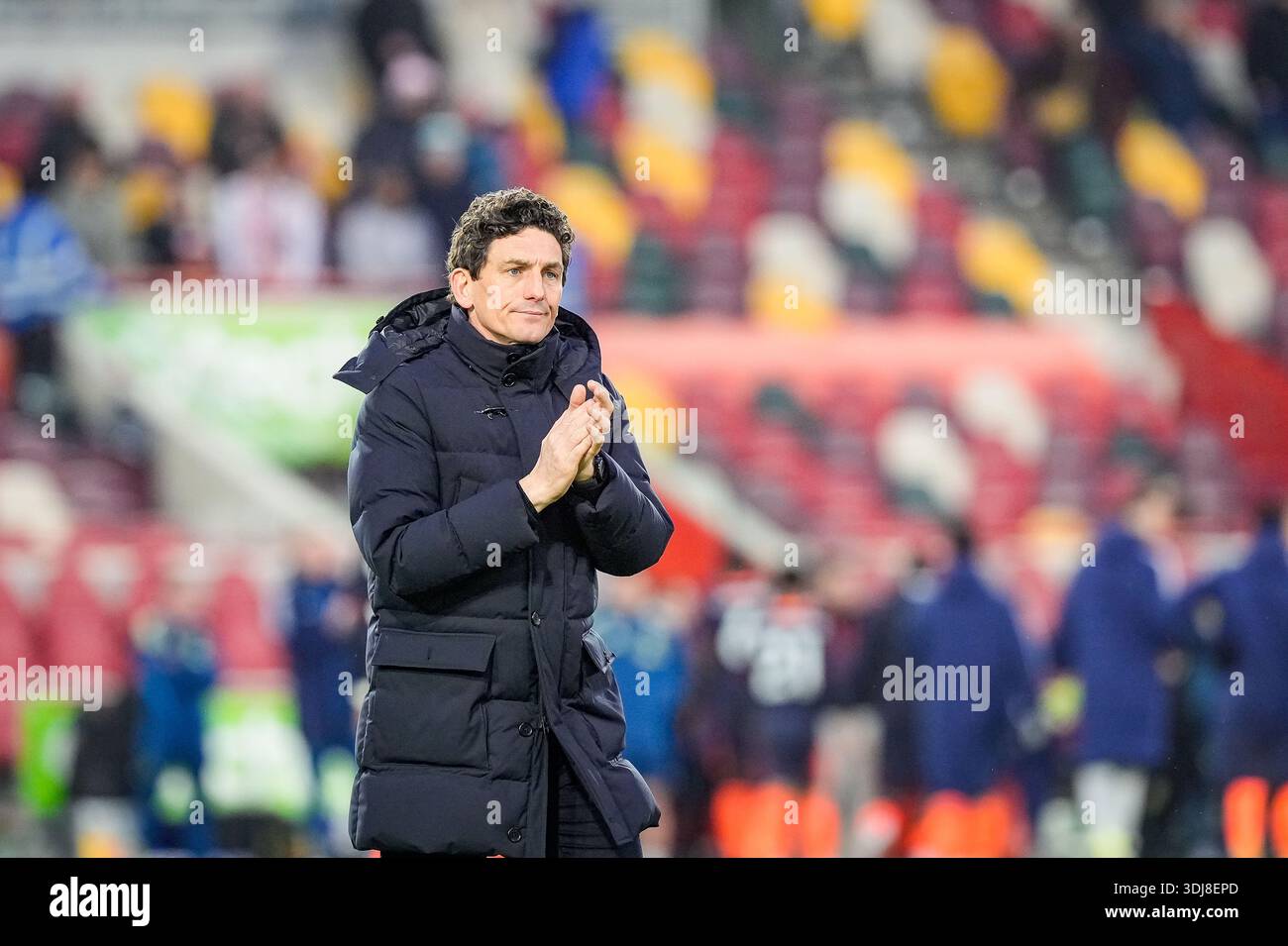 Keith Andrews manager of Brentford applauds the fans after the final ...