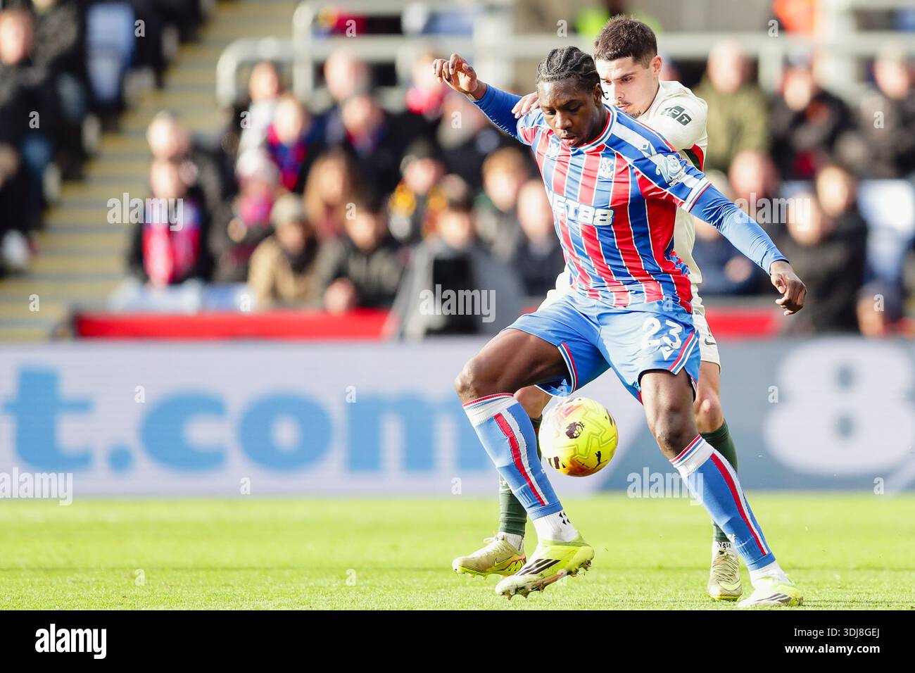Jaydee Canvot (23 Crystal Palace) and Pedro Neto (7 Chelsea) in action ...