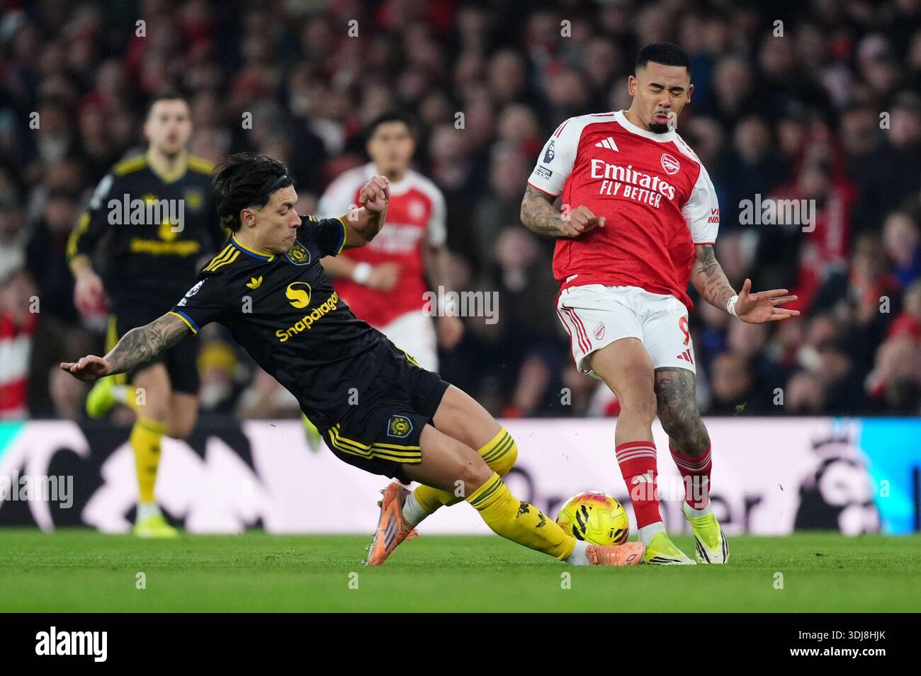 Manchester United's Lisandro Martinez (left) and Arsenal's Gabriel ...