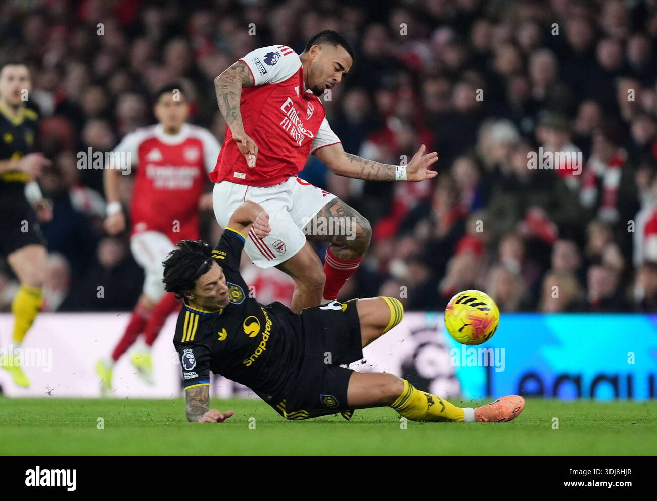 Manchester United's Lisandro Martinez (left) and Arsenal's Gabriel ...