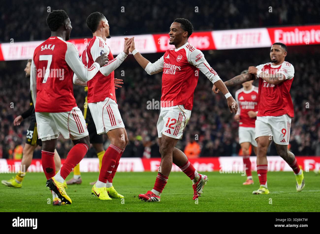 Arsenal's Jurrien Timber (centre) celebrates with team-mate after ...