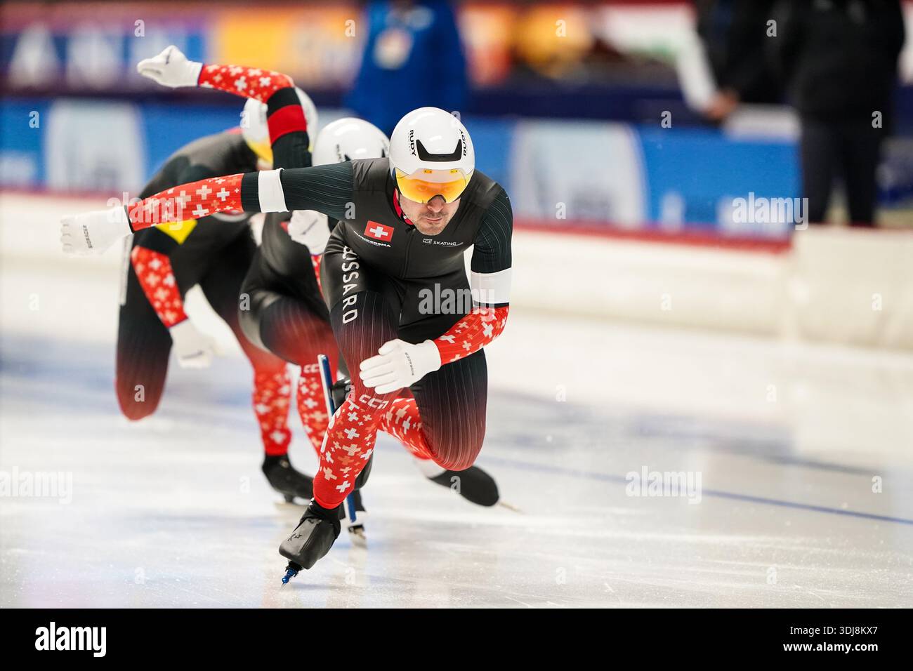 INZELL, GERMANY - JANUARY 25: Oliver Grob of Switzerland, Flavio Gross ...