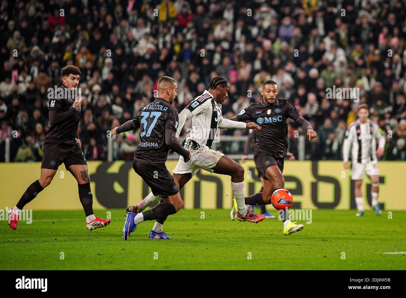 Juventus' Jonathan David, center, scores their side's first goal of the ...