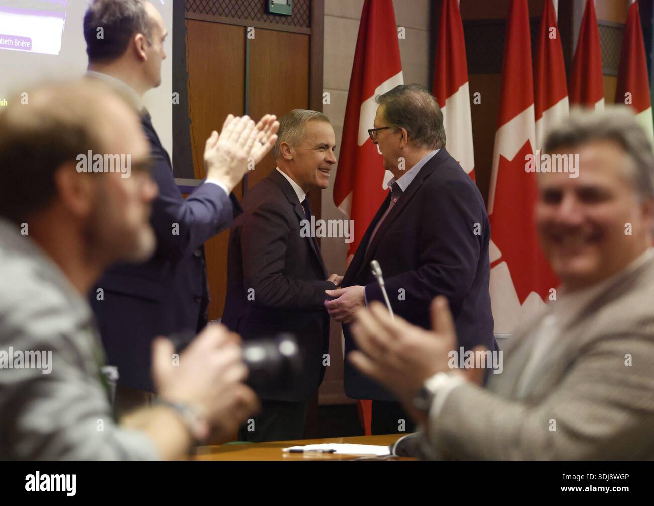 Prime Minister Mark Carney arrives to a caucus meeting on Parliament ...