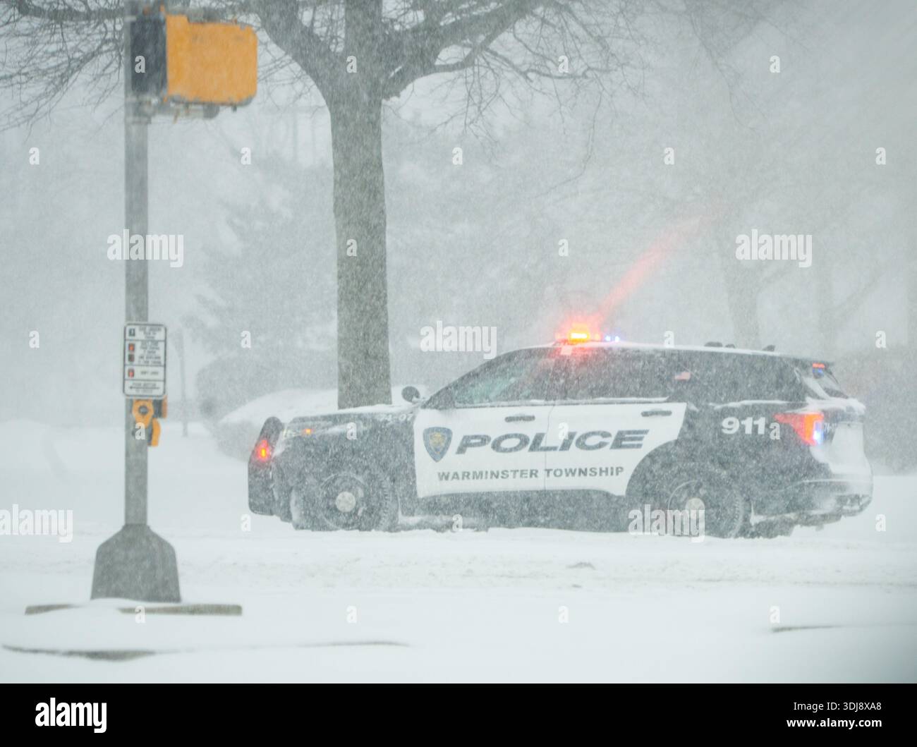 A Warminster police vehicle drives along Street Road Sunday, January 25 ...
