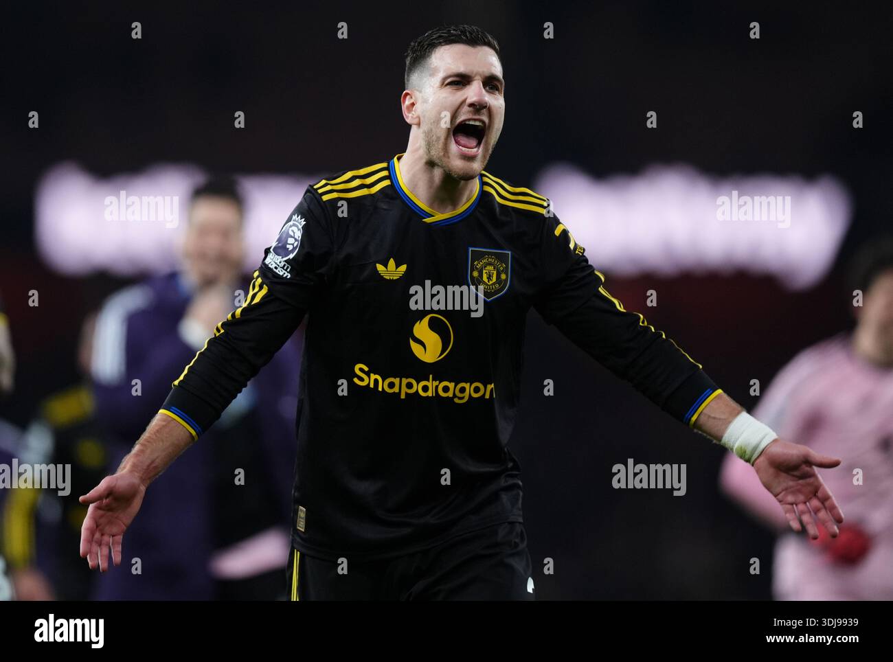 Manchester United's Diogo Dalot celebrates the win after the Premier ...