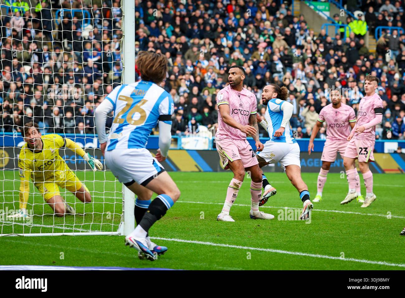 Huddersfield Town midfielder Marcus Harness (10) scores a GOAL 1-0 and ...