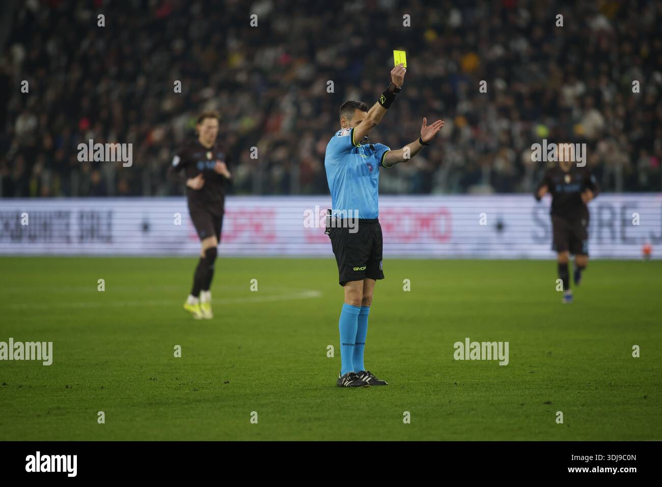 Referee showing a yellow card to Kenan Yildiz of Juventus FC during the ...