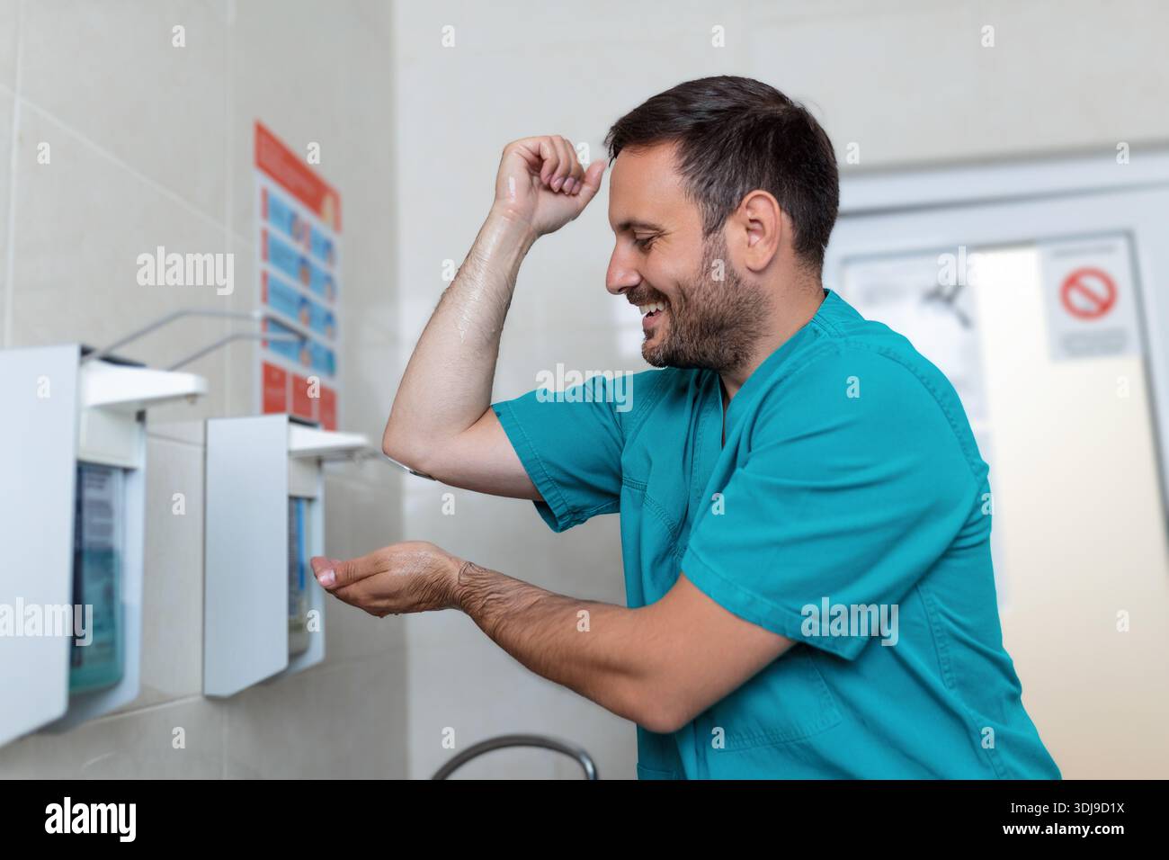 Doctor washing hands with soap. Male surgeon is preparing for surgery ...