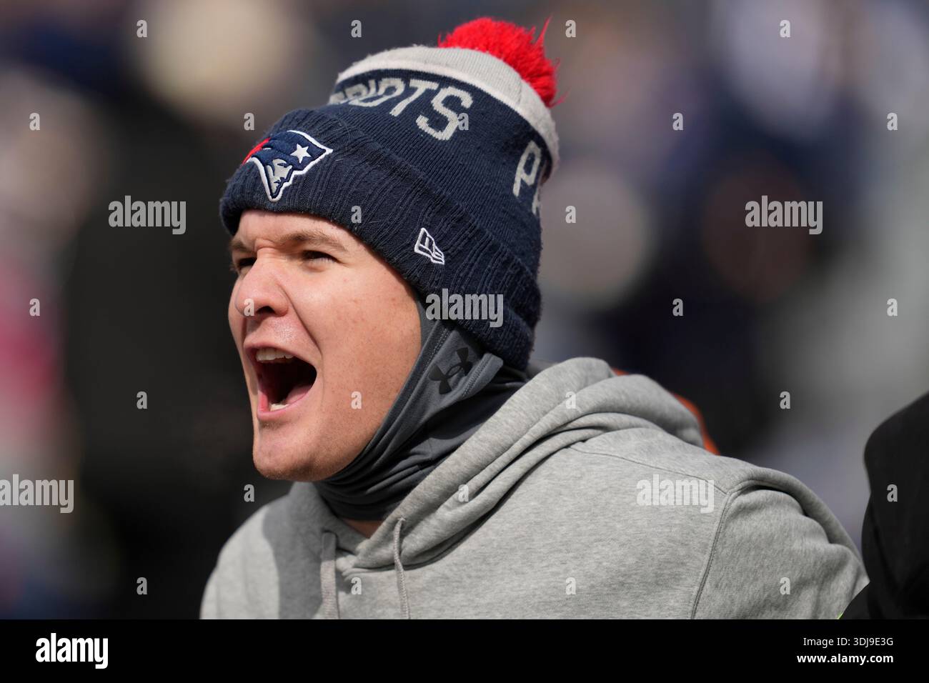 A New England Patriots fan yells prior to the AFC Championship football ...