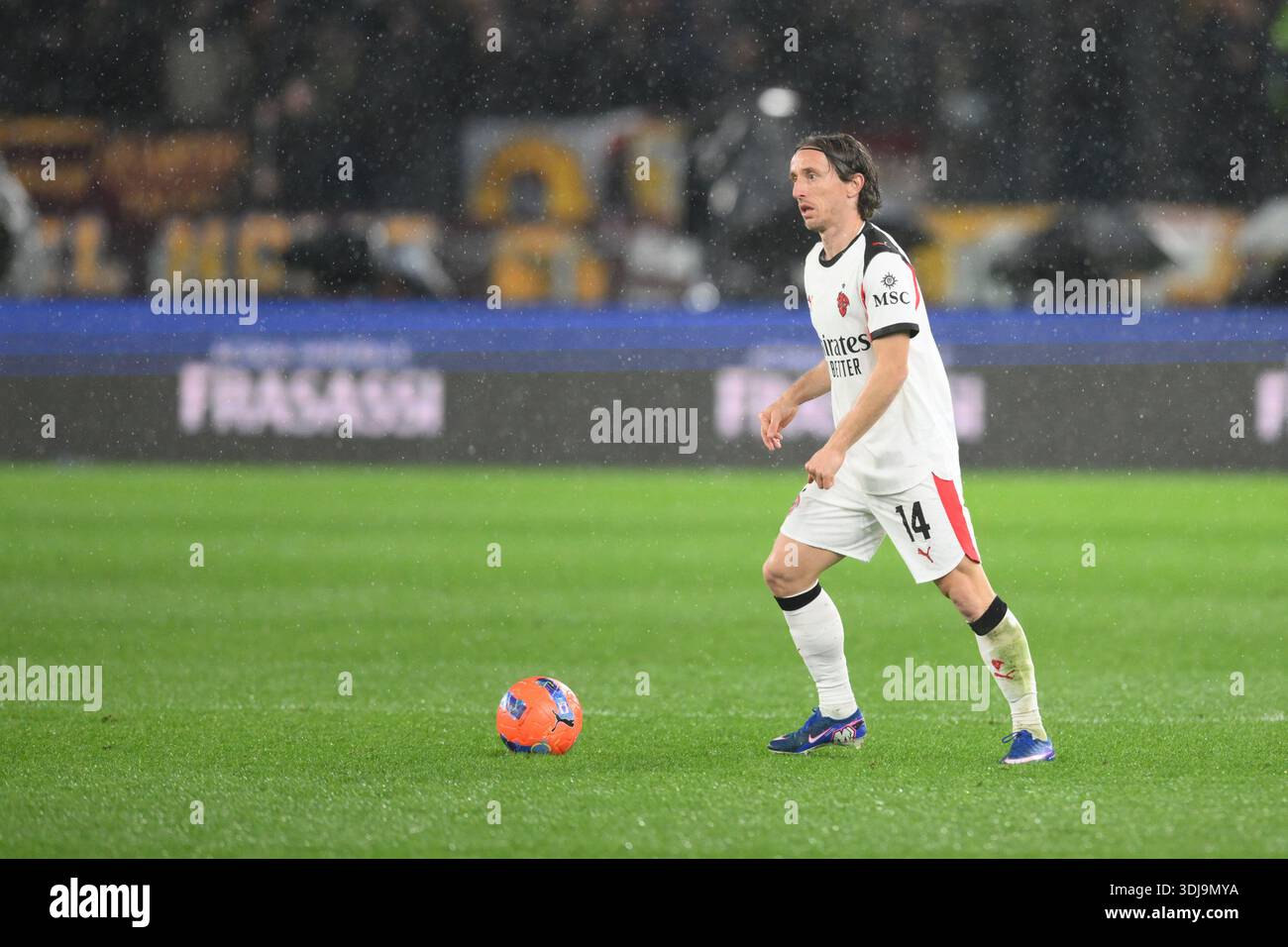 Luka modric of ac milan runs with the ball hi-res stock photography and ...