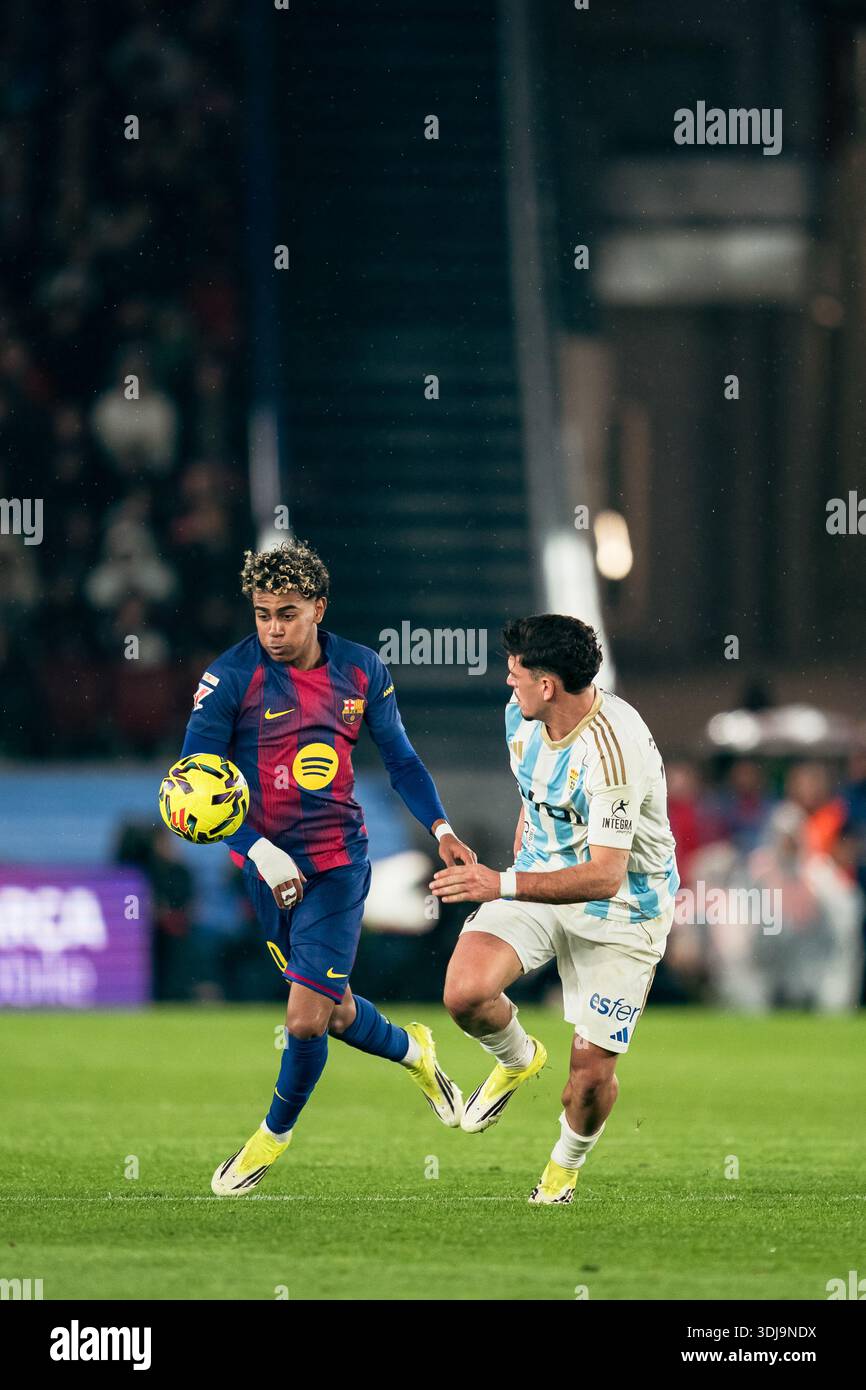 FC Barcelona player (10) Lamine Yamal vies with (25) Javi Lopez during ...