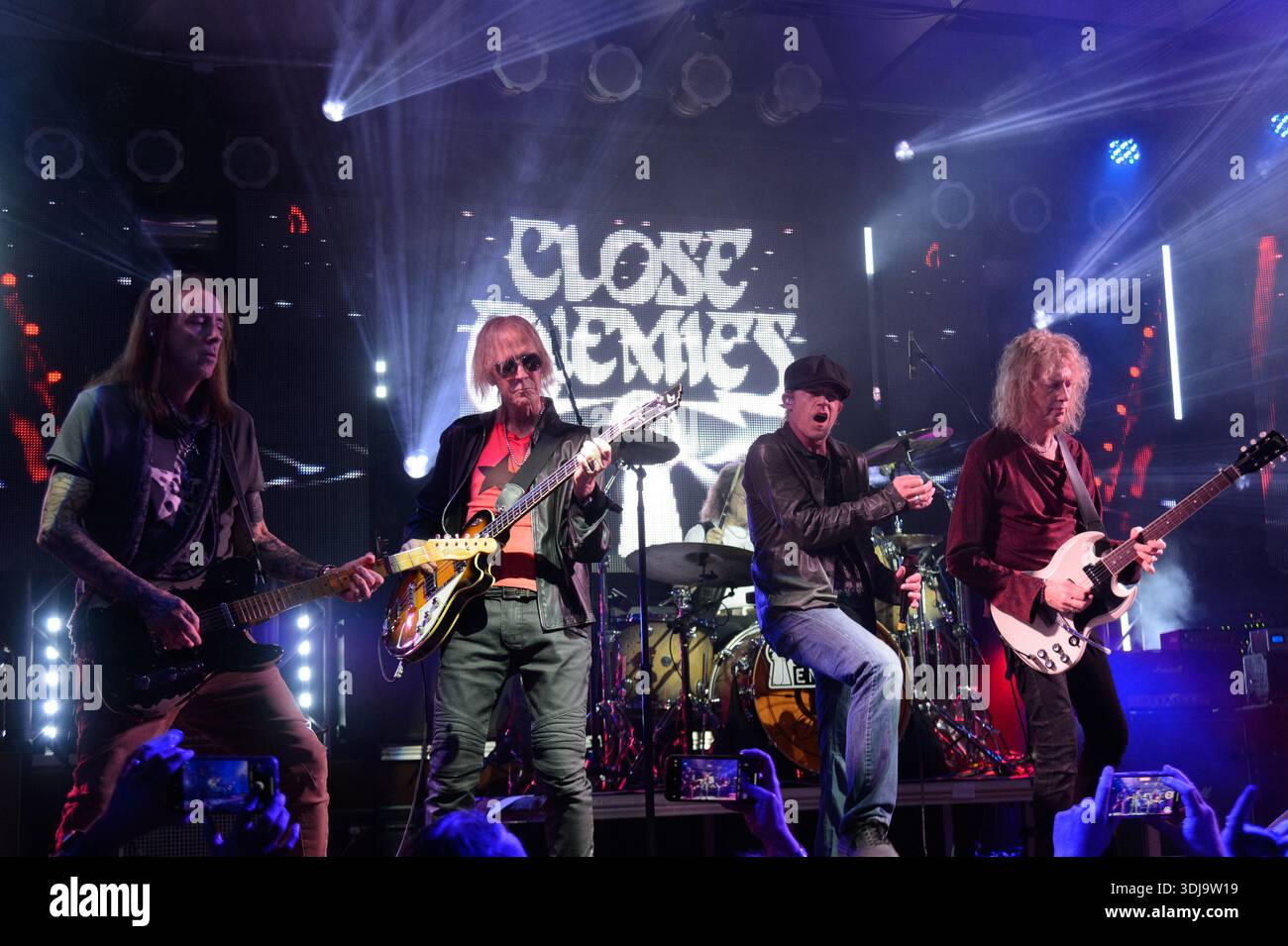 Trace Foster, Tom Hamilton, Chasen Hampton, and Peter Stroud perform ...