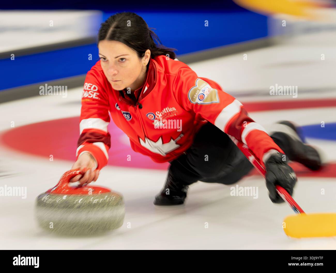 Team Canada skip Kerri Einarson delivers a rock during Scotties ...