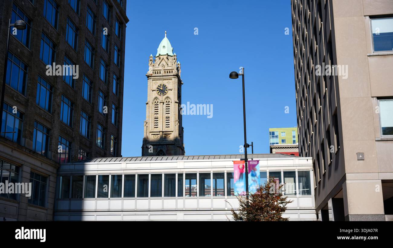 Historic clock tower between modern buildings in Cincinnati Ohio Stock ...