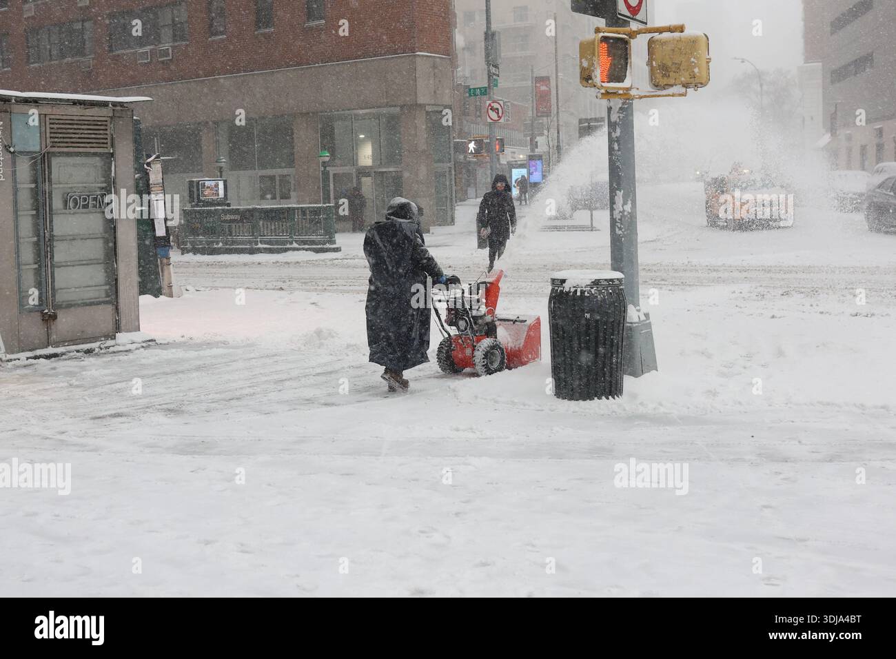 Man uses snowblower remove hi-res stock photography and images - Alamy