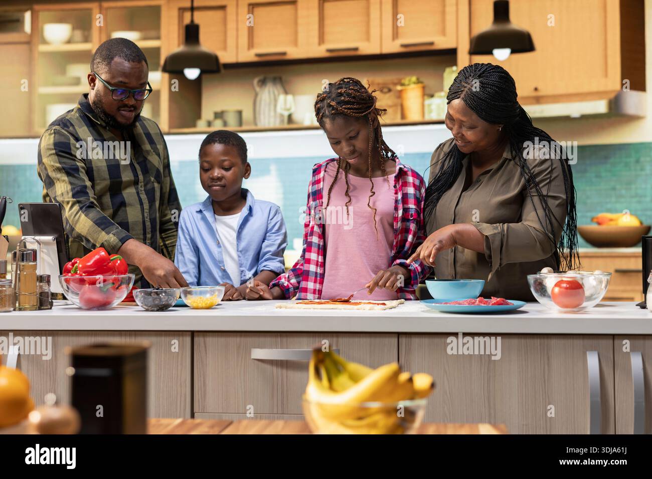 Parents teaching children delicious hi-res stock photography and images ...