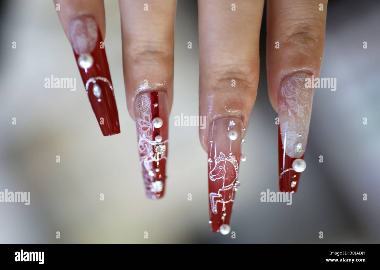 LIANYUNGANG, CHINA - JANUARY 25, 2026 - A girl showcases her Chinese ...