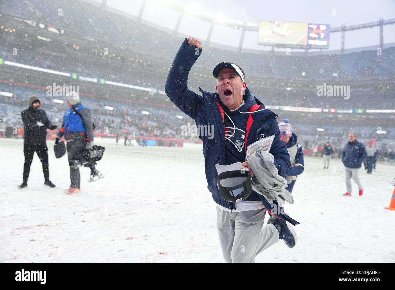 Offensive Coordinator Josh McDaniels celebrates the win post game ...