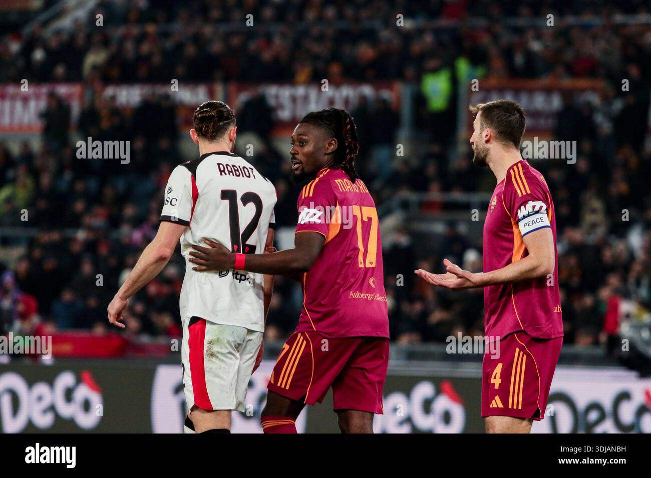 Adrien Rabiot of AC Milan and Manu Kone of AS Roma during AS Roma vs AC ...