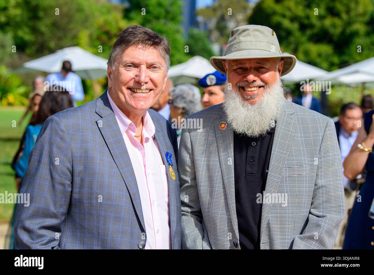 Mike Zervos OAM Ceo of Courage to Care poses with Wurundjeri Woi ...