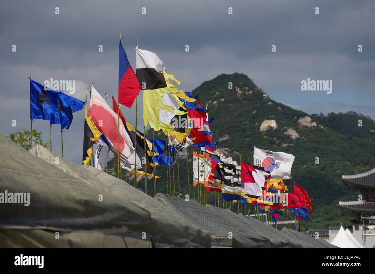 Seoul, South Korea: Traditional Joseon dynasty flags and South Korean ...