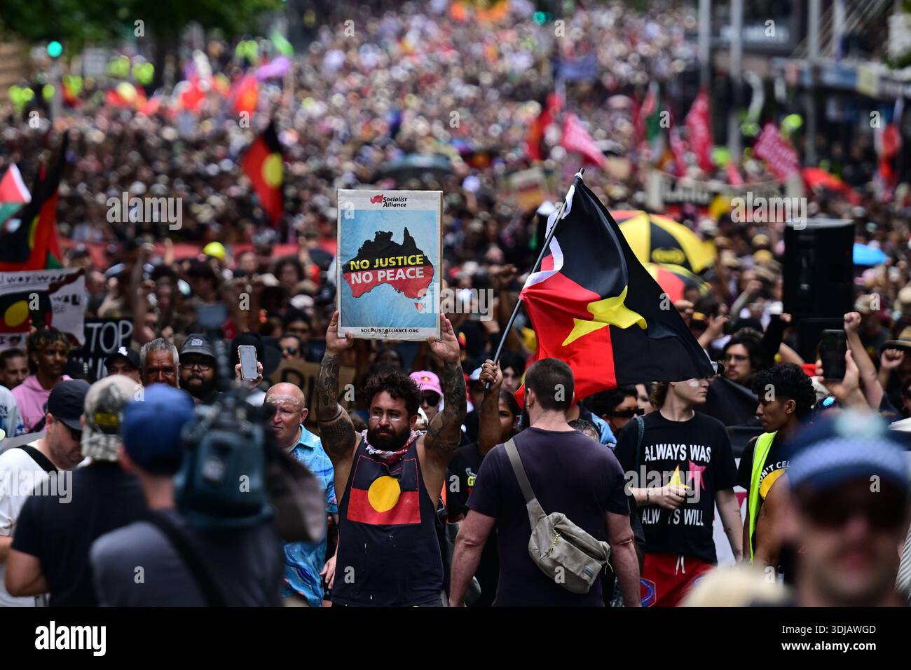 Sydney, Australia. 26th Jan, 2026. Protesters march through the CBD ...
