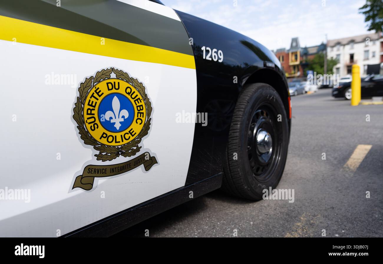 Une voiture de police de la Sûreté du Québec est visible à son quartier ...