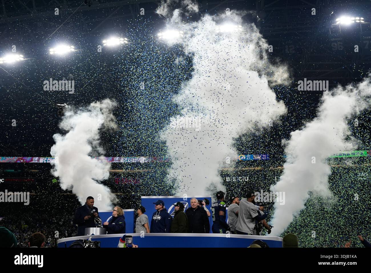 Michael Strahan, left, talks with Seattle Seahawks Chair Jody Allen ...