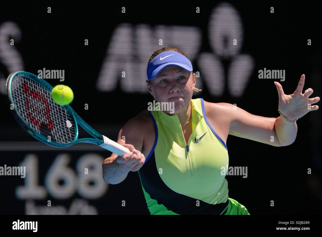Amanda Anisimova of the U.S. plays a forehand return to Wang Xinyu of ...
