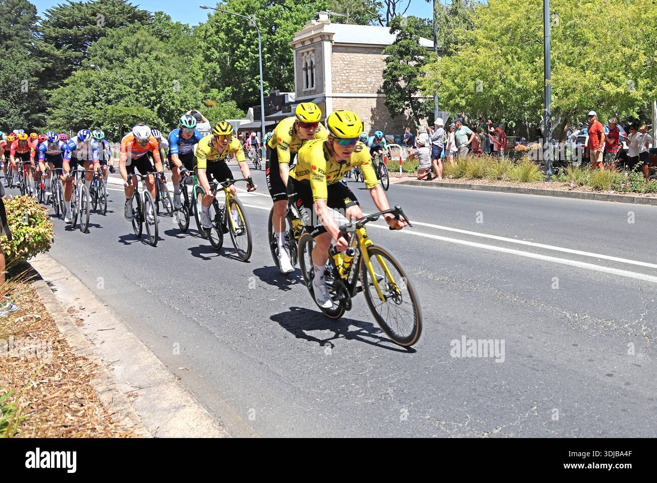 Riders passing through the Adelaide Hills town of Aldgate during stage ...