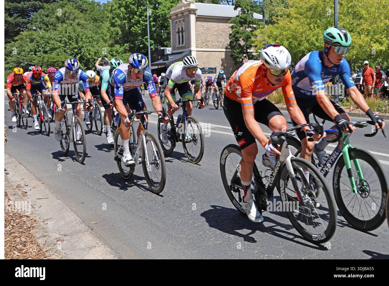 Riders passing through the Adelaide Hills town of Aldgate during stage ...